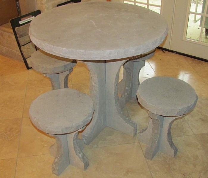 Custom stone cuts finished edges in window sills and water tables.