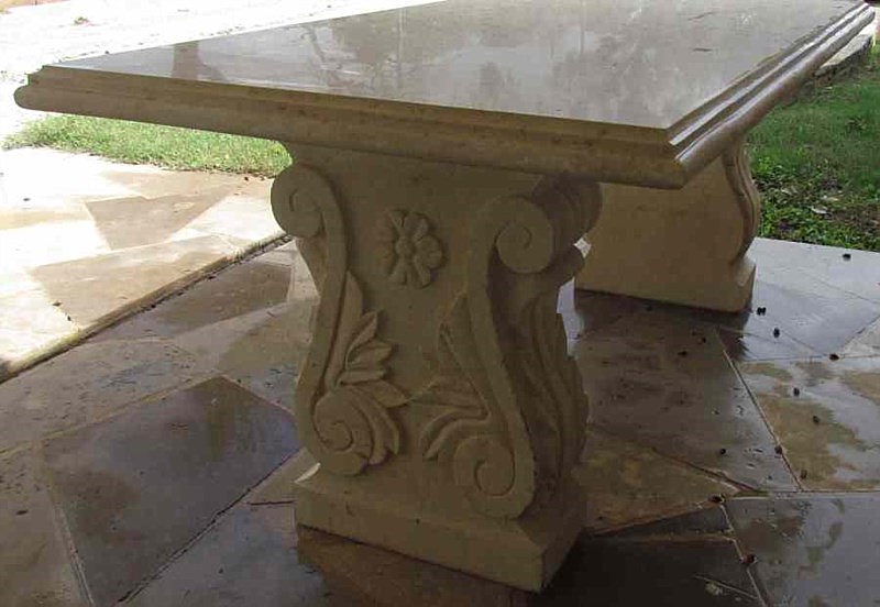 Custom stone cuts finished edges in window sills and water tables.